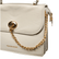 Ivory Luxe Handbag with Golden Twist Clasp and Chain Detail – Zari Villas